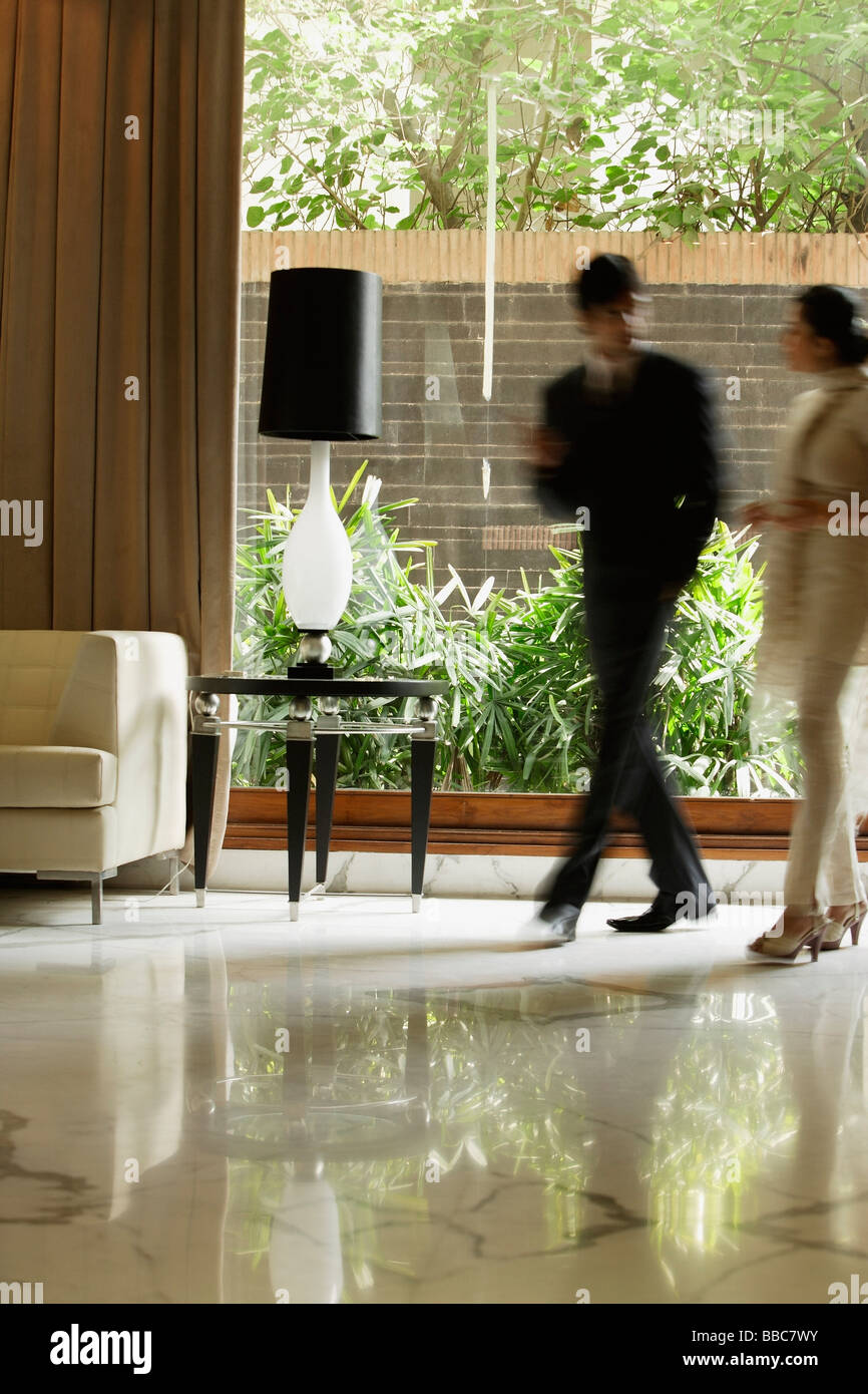 colleagues in hotel lobby Stock Photo - Alamy