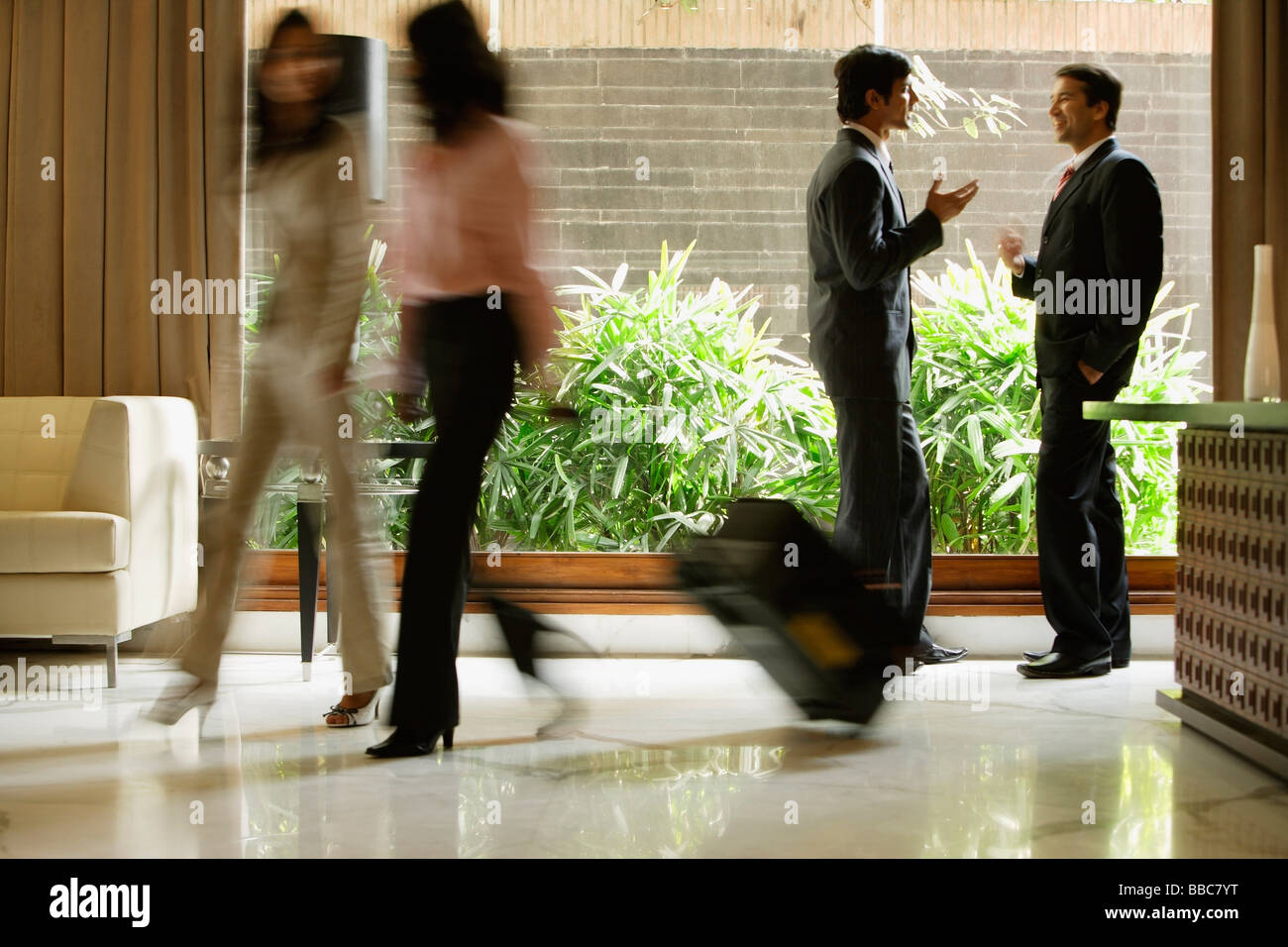 busy hotel lobby Stock Photo - Alamy