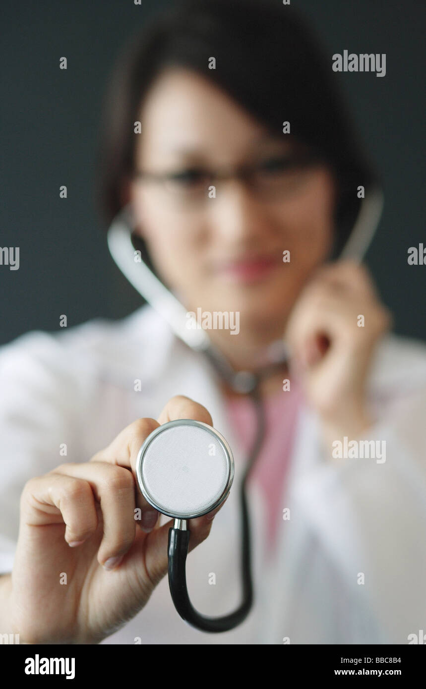 Doctor using stethoscope on back hi-res stock photography and images ...