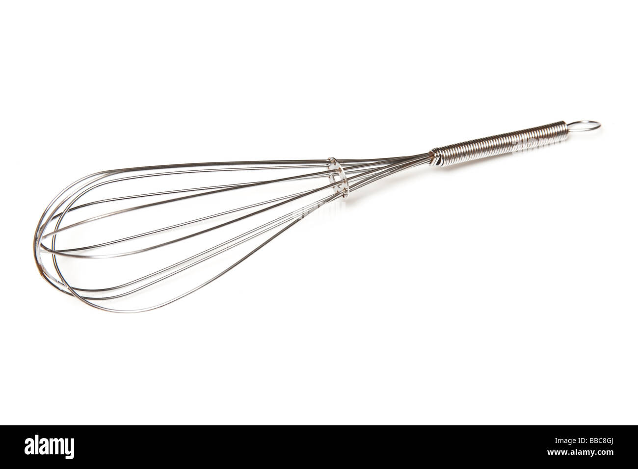 whisk isolated on a white studio background Stock Photo - Alamy