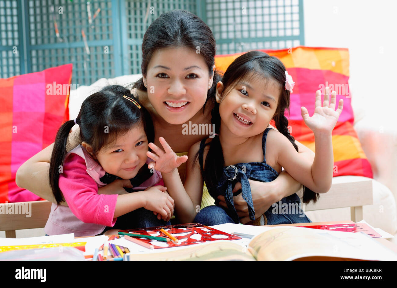 Mother and two daughters Stock Photo - Alamy