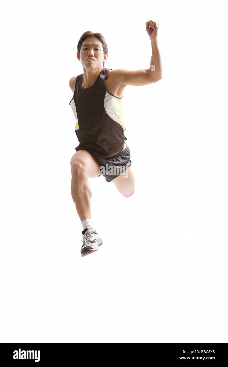 Young man running Stock Photo - Alamy