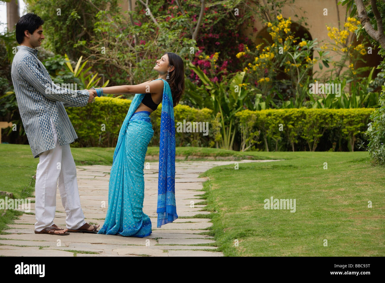 young couple dancing in garden Stock Photo - Alamy