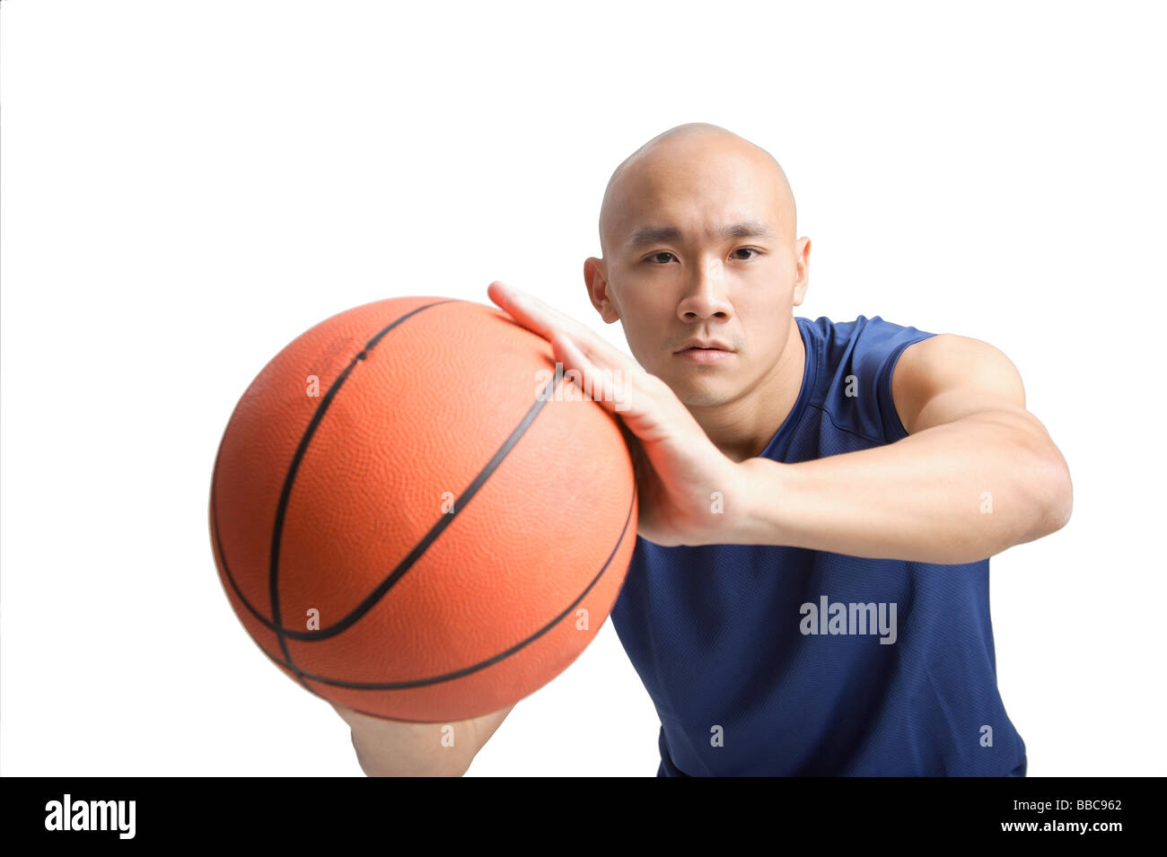 Man holding basketball towards camera hi-res stock photography and ...