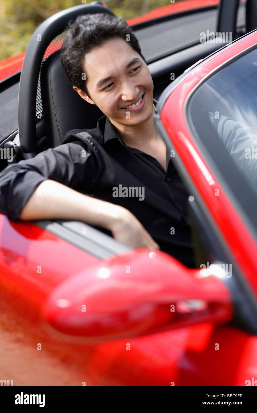 Man in red car hi-res stock photography and images - Alamy