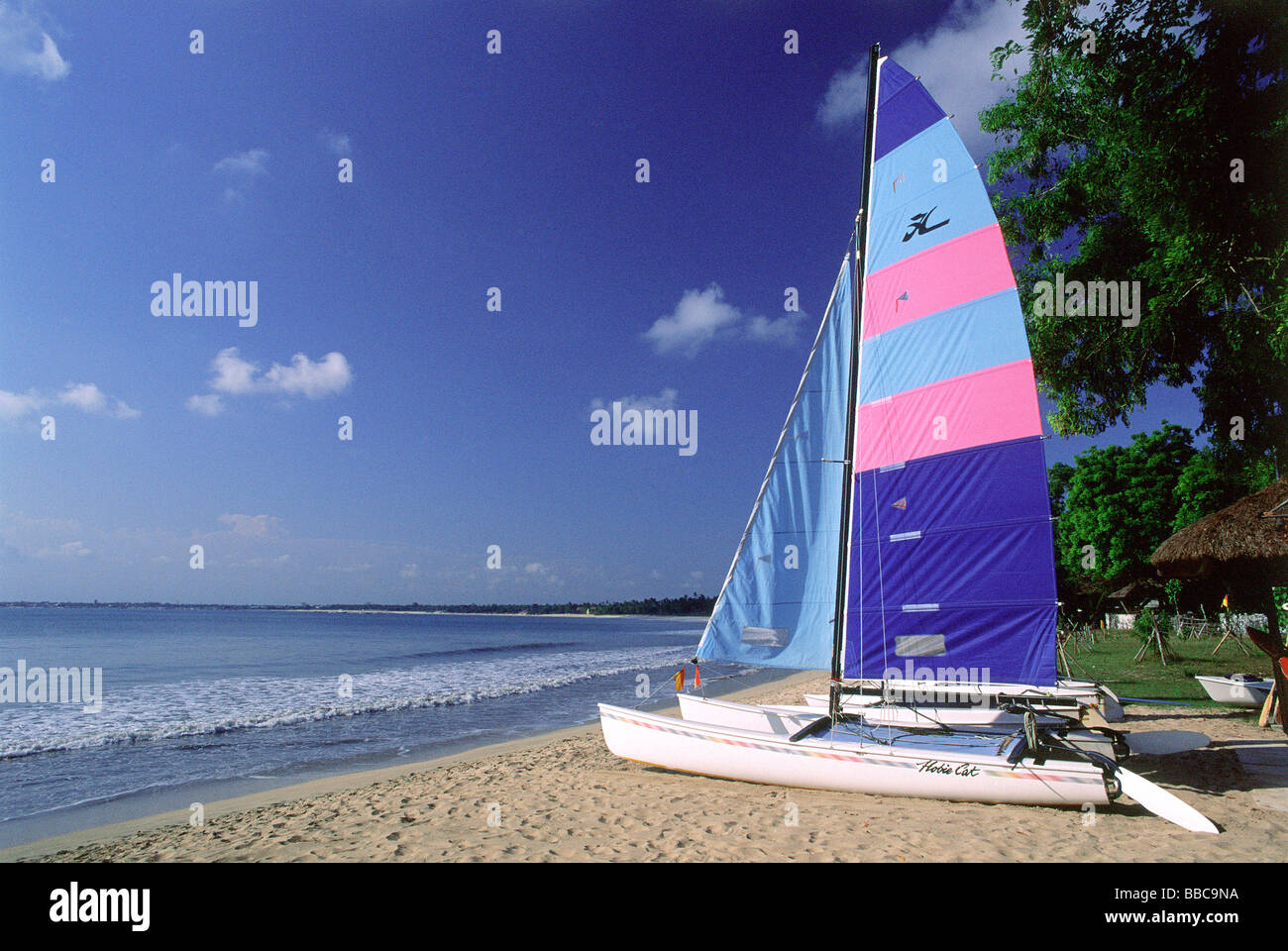 Indonesia, Bali, Jimbaran Bay, Sail boat on beach. (grainy Stock Photo ...