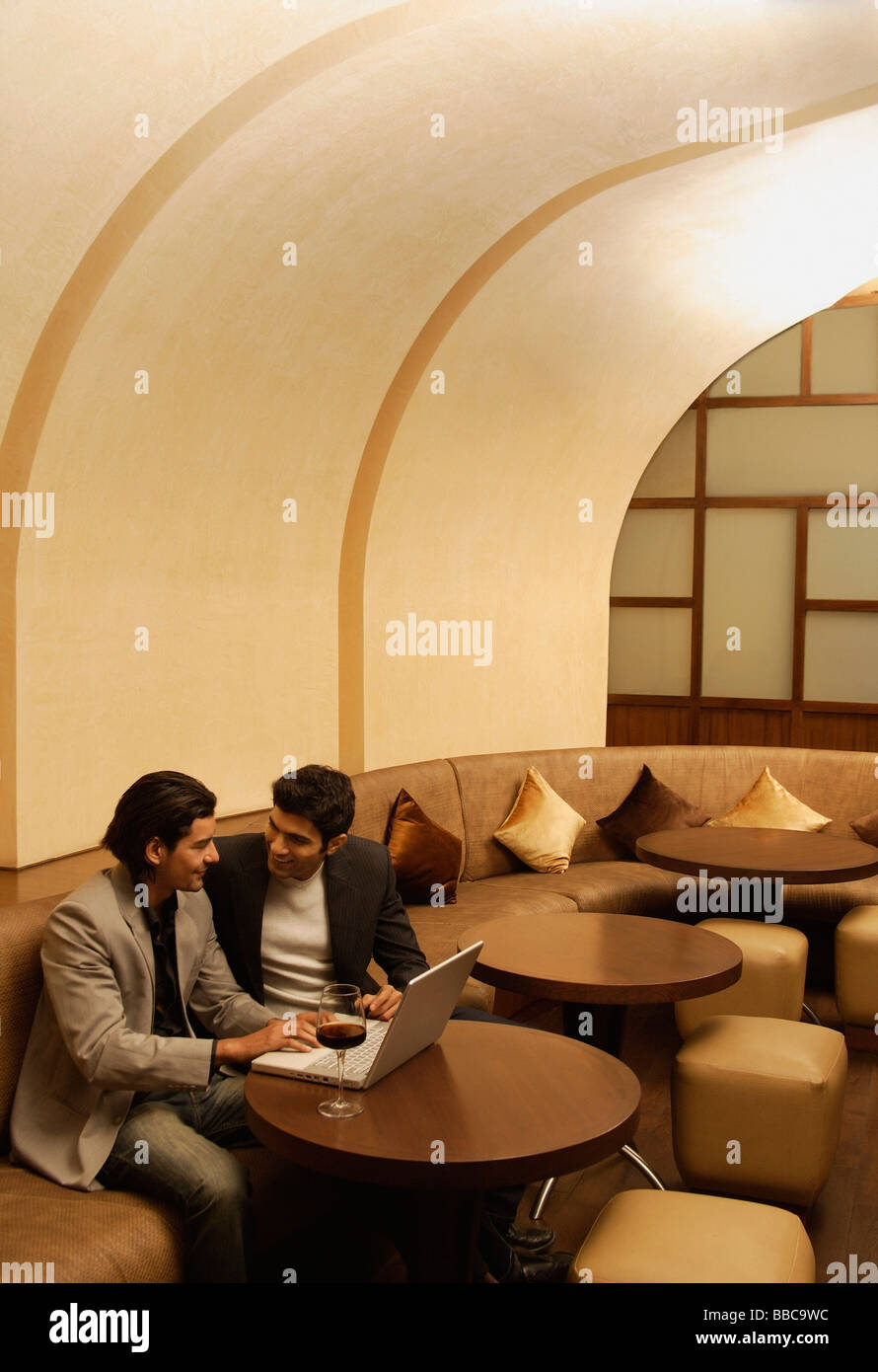 two men at laptop Stock Photo - Alamy