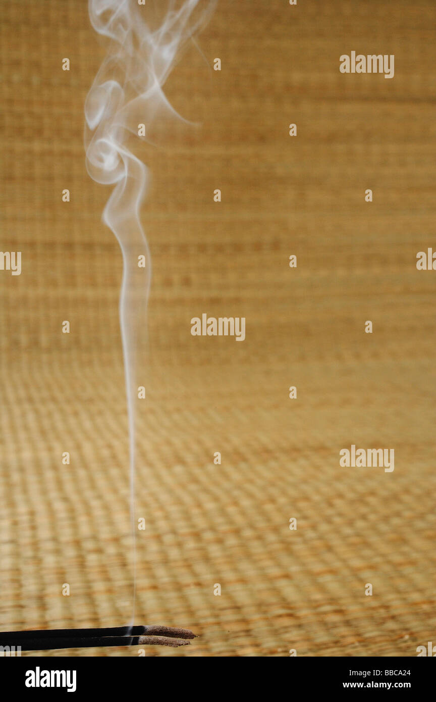Still life of burning incense sticks Stock Photo - Alamy