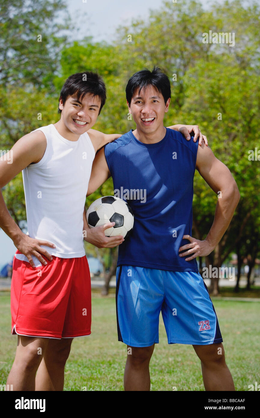 Two men standing together hi-res stock photography and images - Alamy