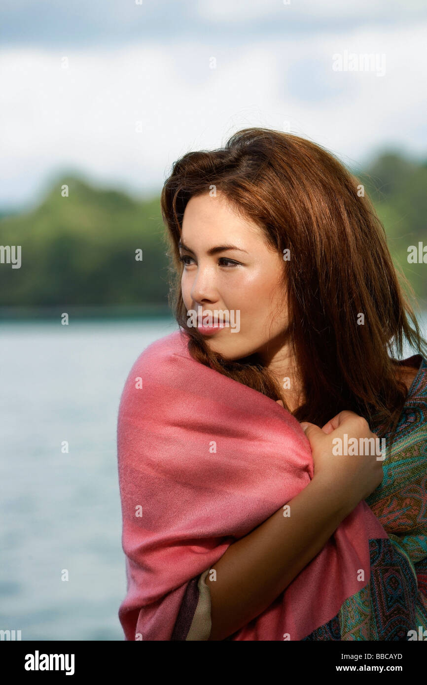 Profile of woman, wrapped in shawl Stock Photo - Alamy