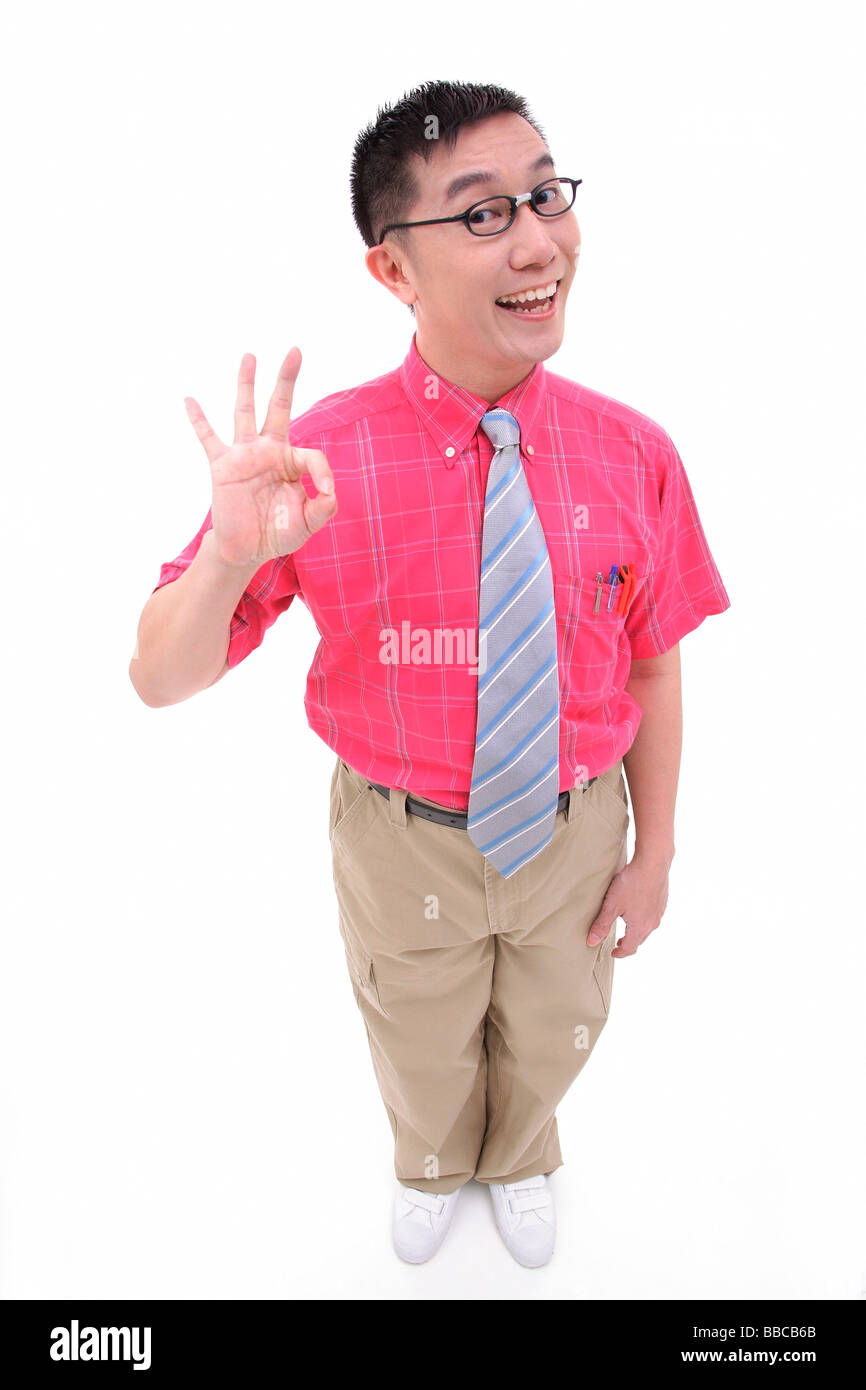 Man making Ok hand sign, portrait Stock Photo - Alamy
