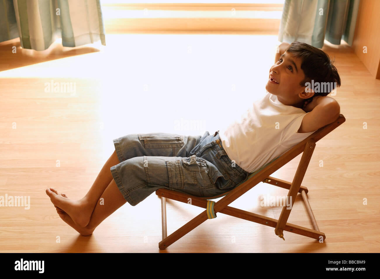 little boy in chair Stock Photo - Alamy