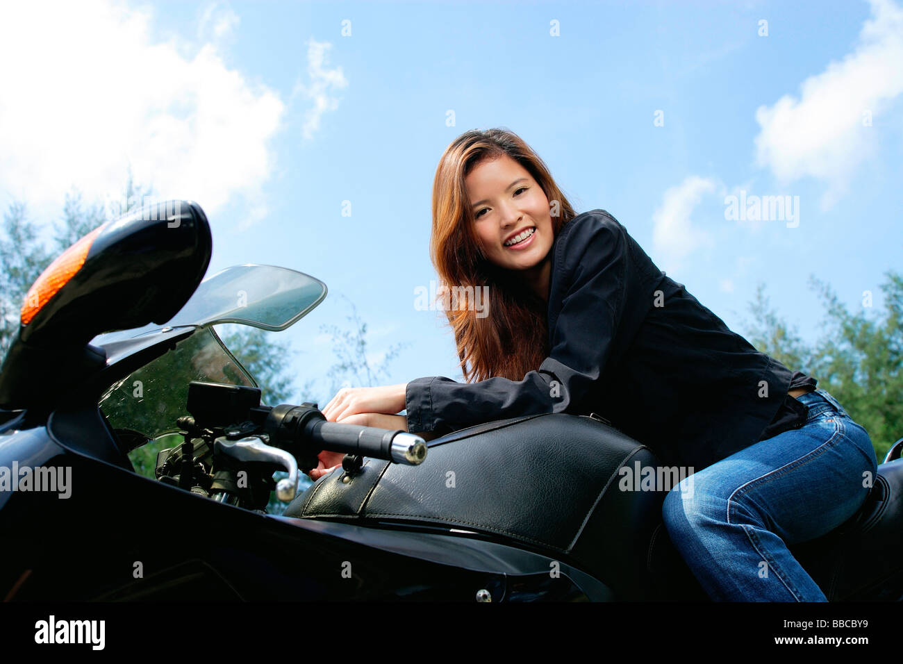 Biker riding motorcycle low angle hi-res stock photography and images ...
