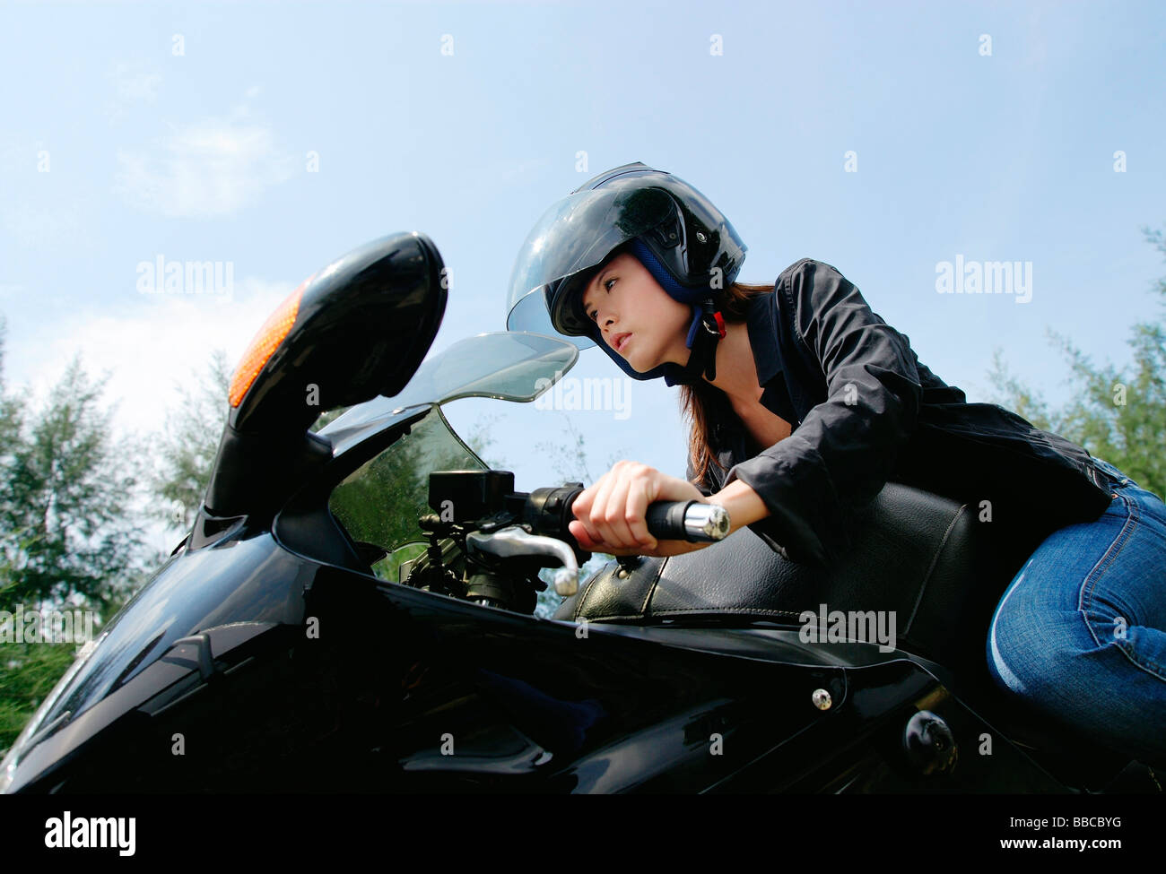 Biker riding motorcycle low angle hi-res stock photography and images ...