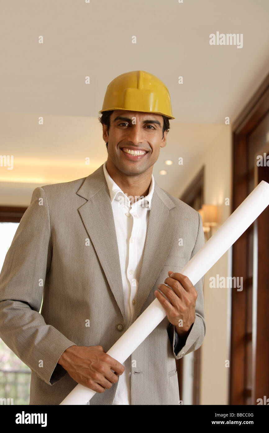 portrait of contractor with blueprints Stock Photo - Alamy