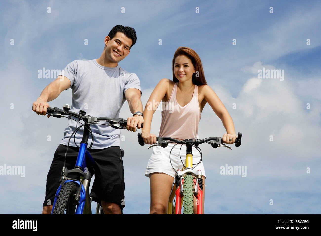 Couple on bicycles Stock Photo - Alamy