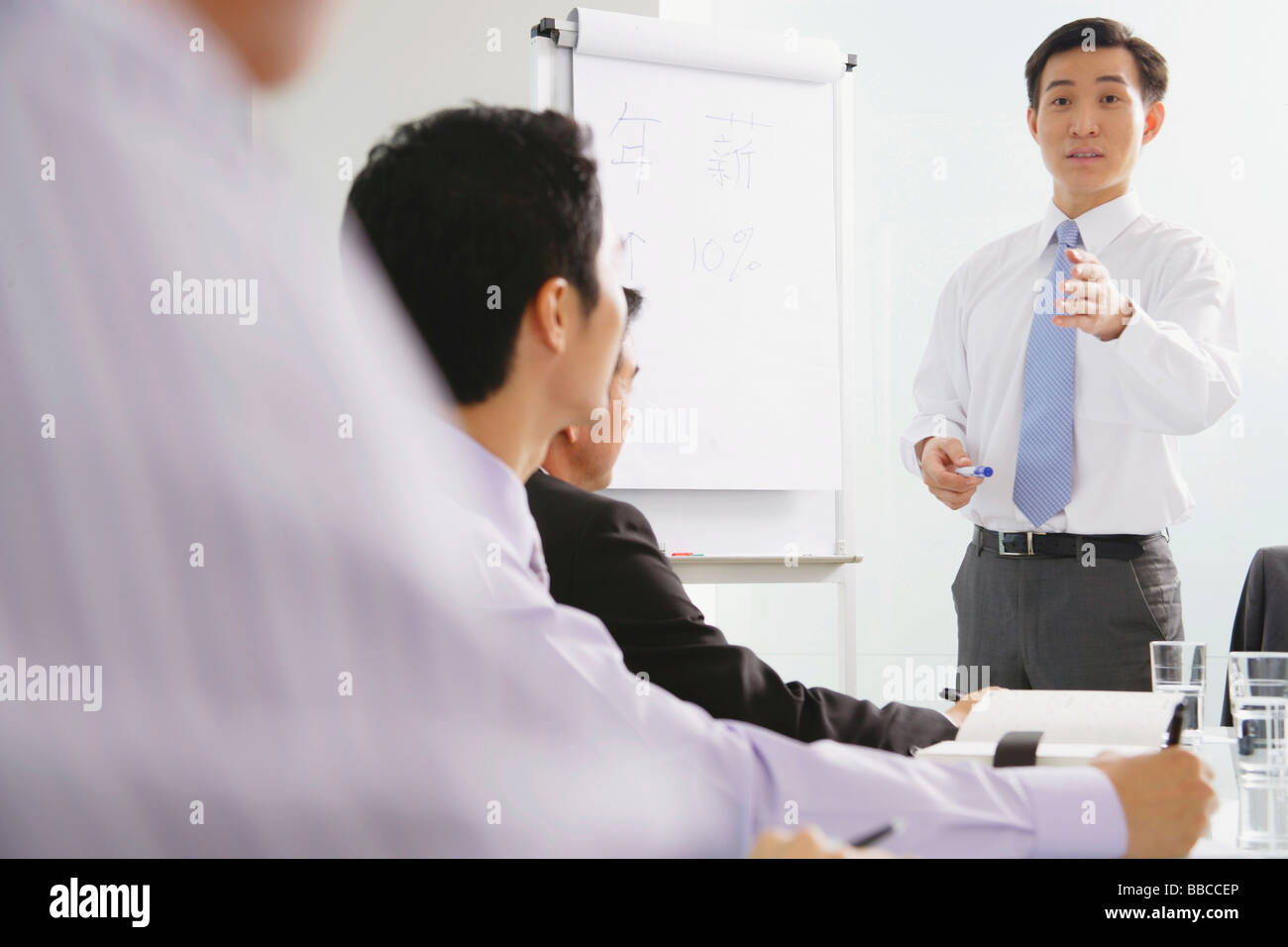 Four business executives talking hi-res stock photography and images ...