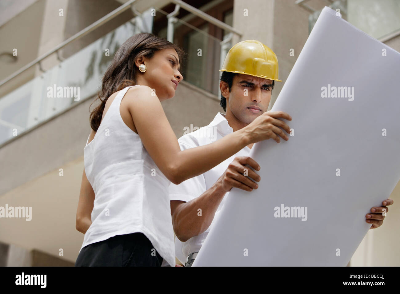 contractor or architect with blueprints Stock Photo - Alamy