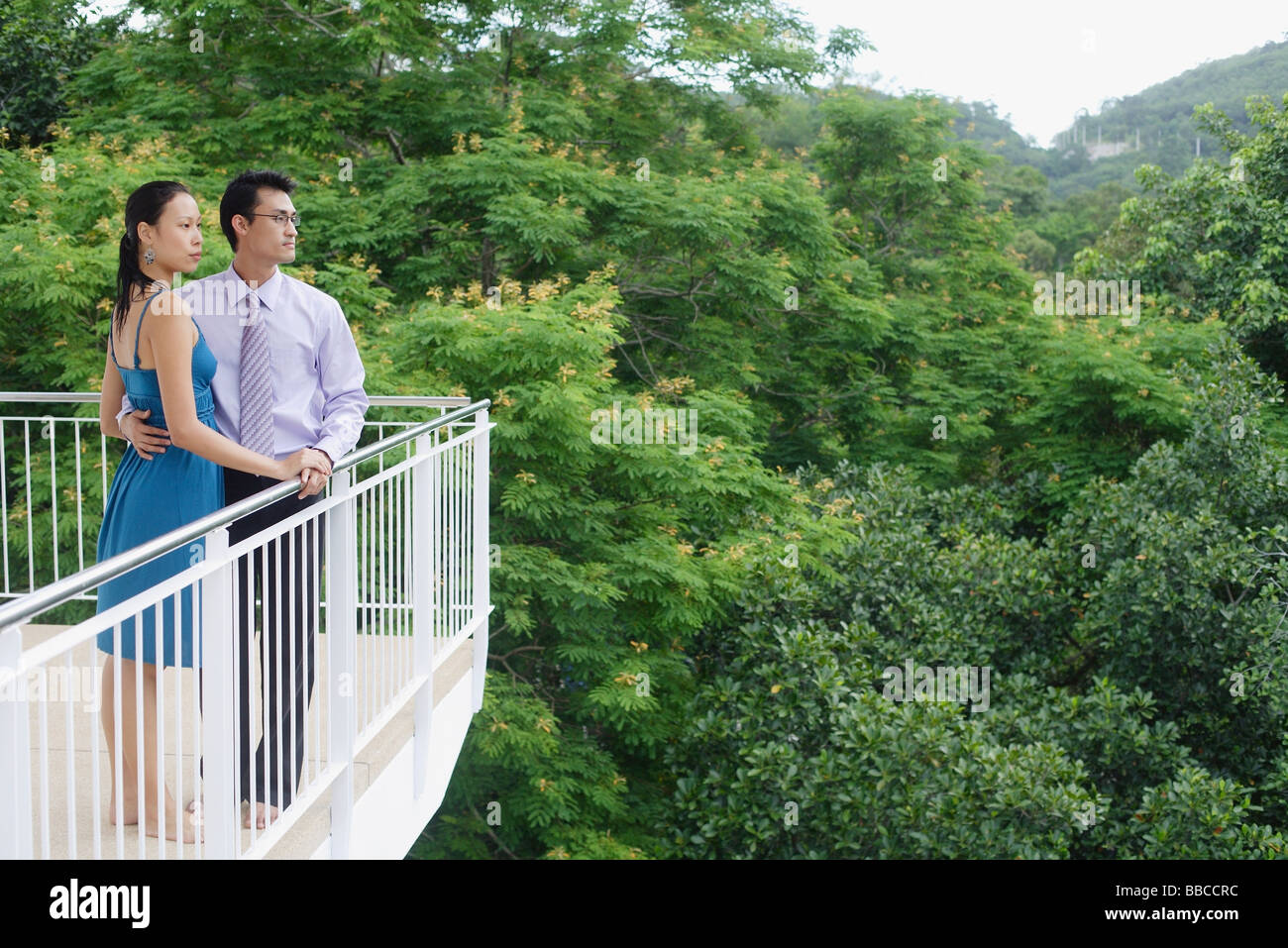 Back young woman standing balcony looking view hi-res stock photography ...
