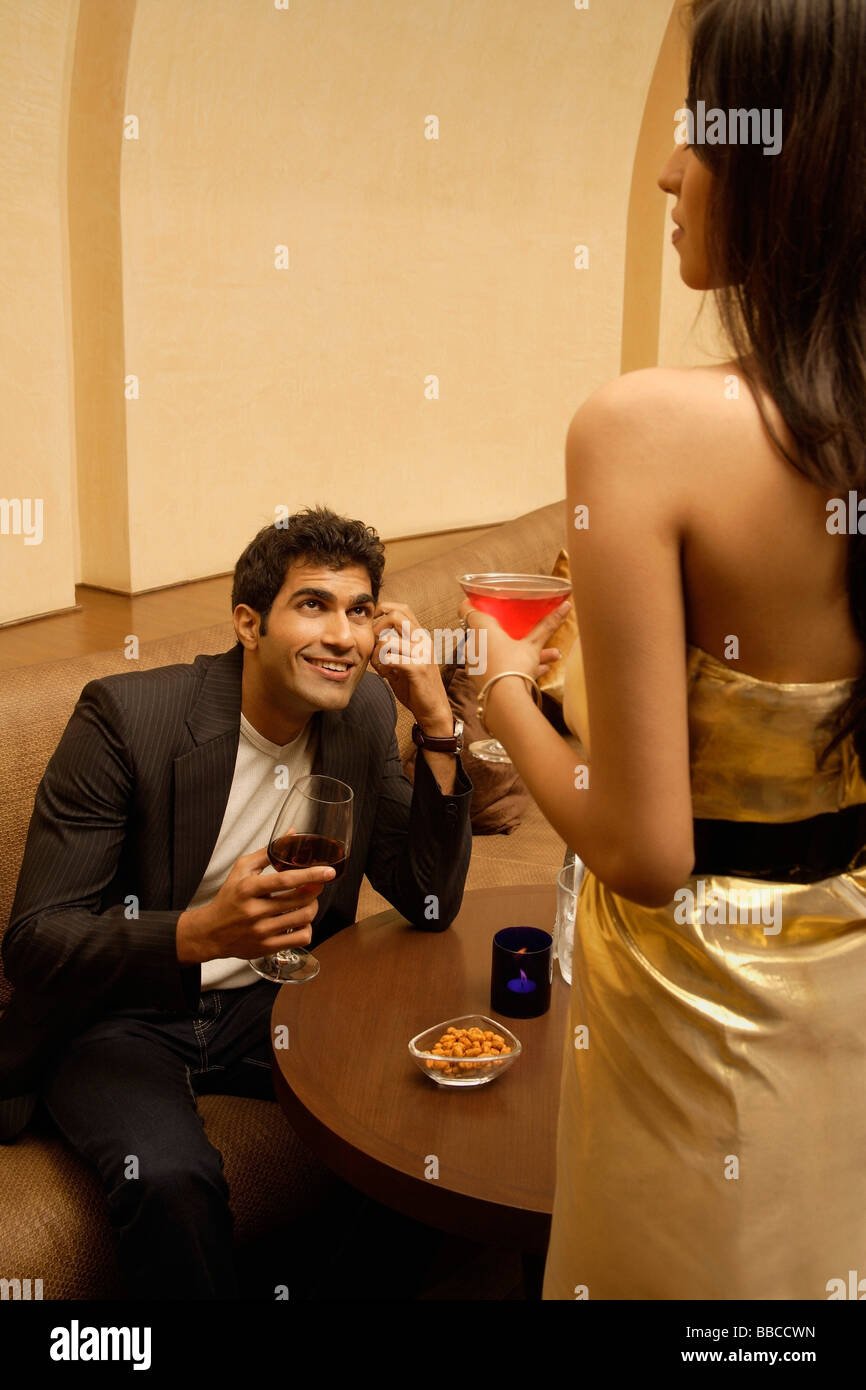 Man smiling up at woman Stock Photo - Alamy