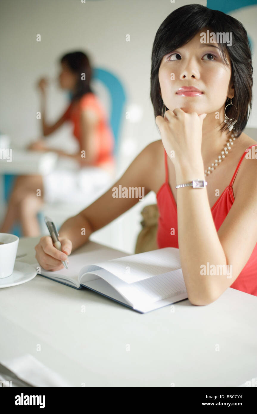 Hand woman writing notebook hi-res stock photography and images - Alamy