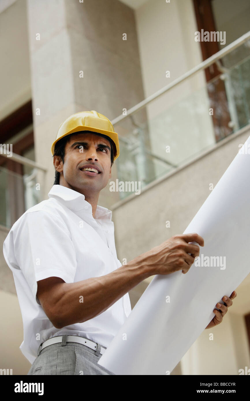 contractor with blueprints Stock Photo - Alamy