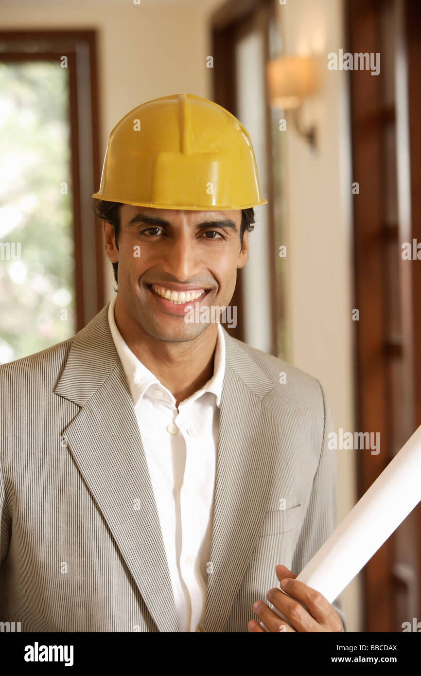 portrait of contractor with blueprints Stock Photo - Alamy