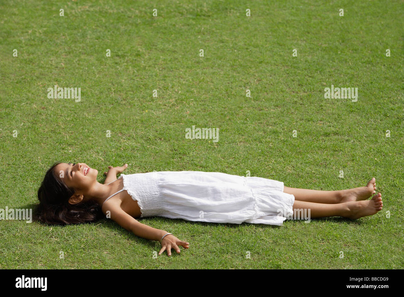 little girl in park Stock Photo - Alamy