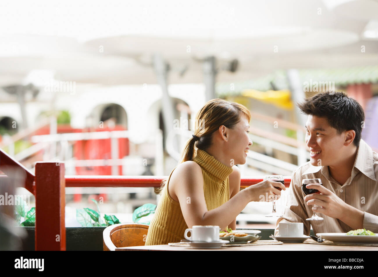 Couple dining in cafe Stock Photo - Alamy
