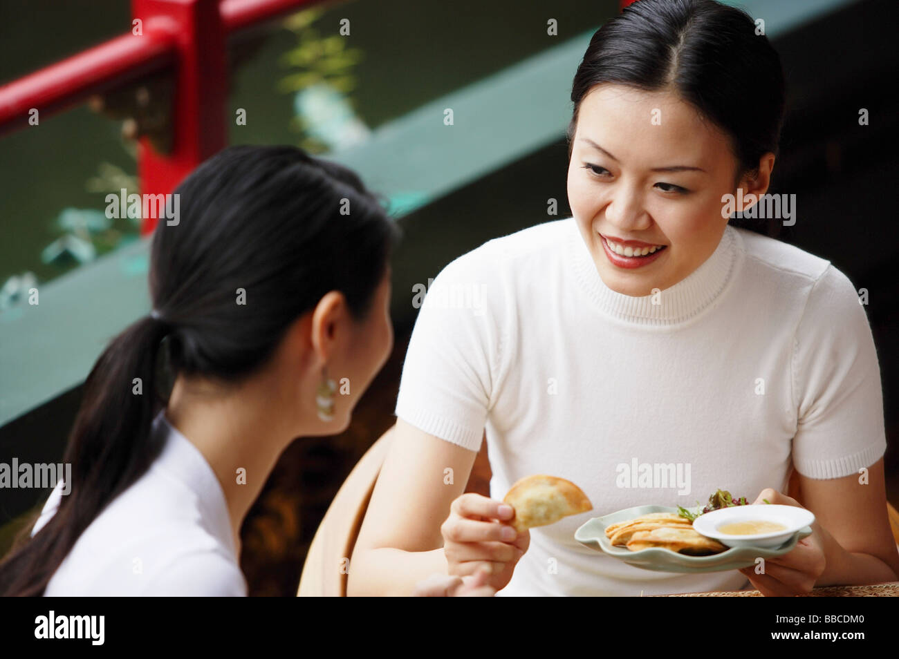 Women in cafe, eating Stock Photo - Alamy