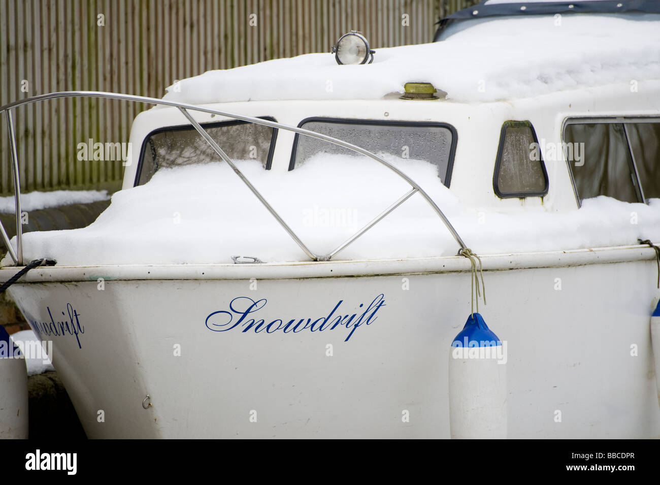 Boat called Snowdrift covered in snow Stock Photo - Alamy