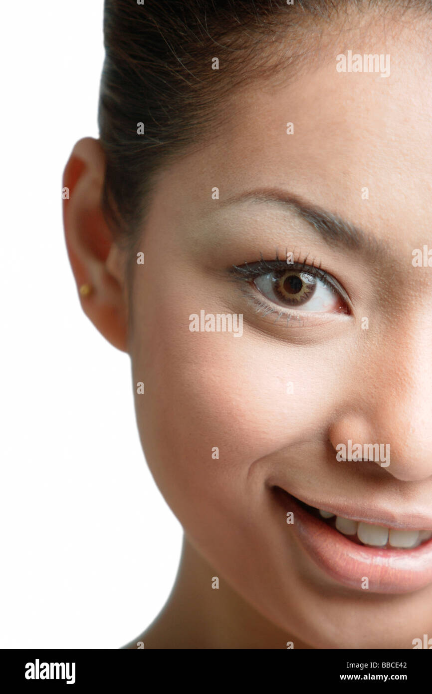 Young woman looking at camera, head shot Stock Photo - Alamy