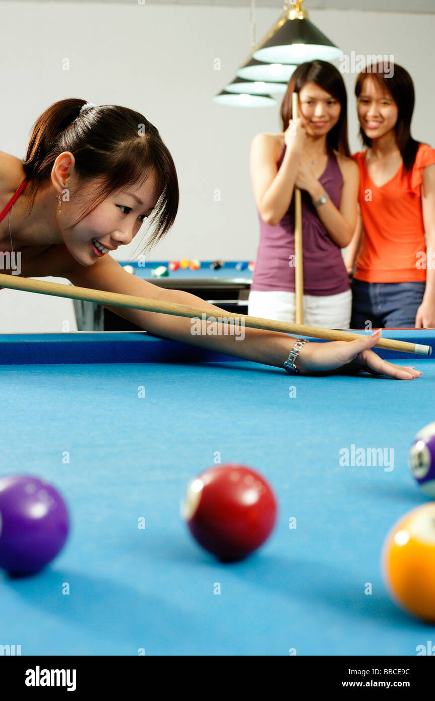Women playing pool Stock Photo - Alamy