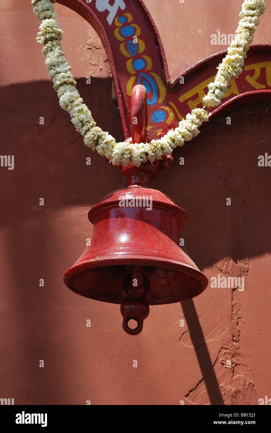 Red bell at Hindu temple in the city of Delhi, India Stock Photo - Alamy
