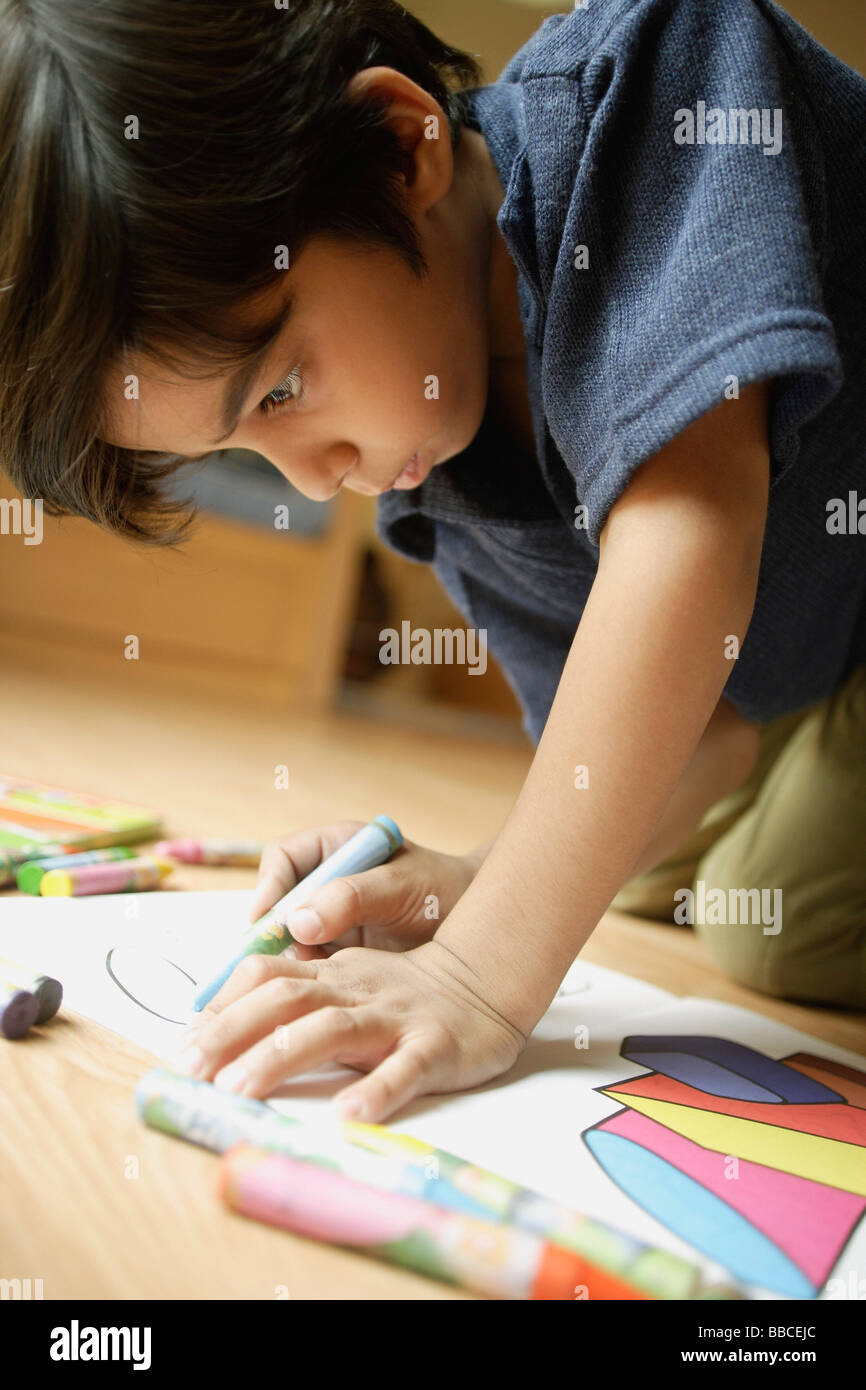 Little boy coloring Stock Photo - Alamy