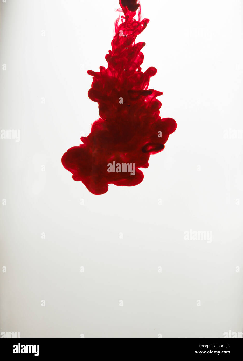 Red liquid in water Stock Photo - Alamy