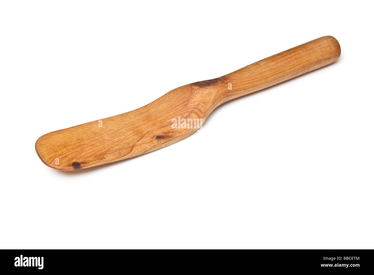 Wooden spatula isolated on a white studio background Stock Photo - Alamy