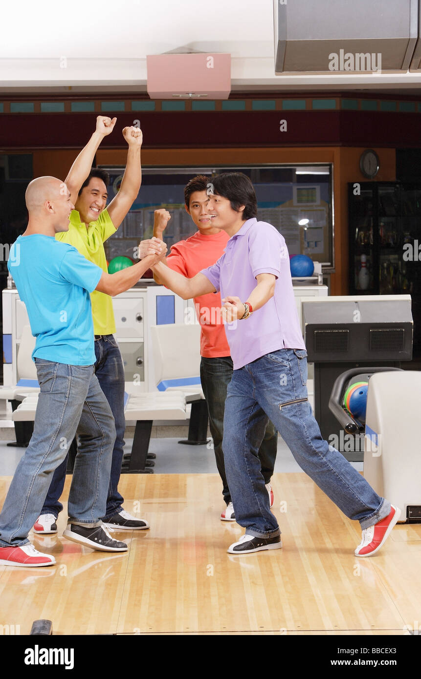 Four guys hi-res stock photography and images - Alamy