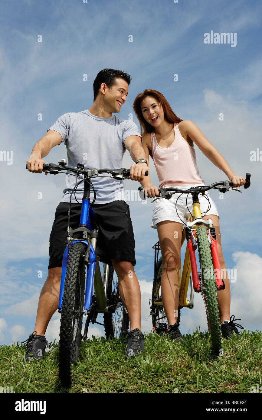 Couple on bicycles Stock Photo - Alamy