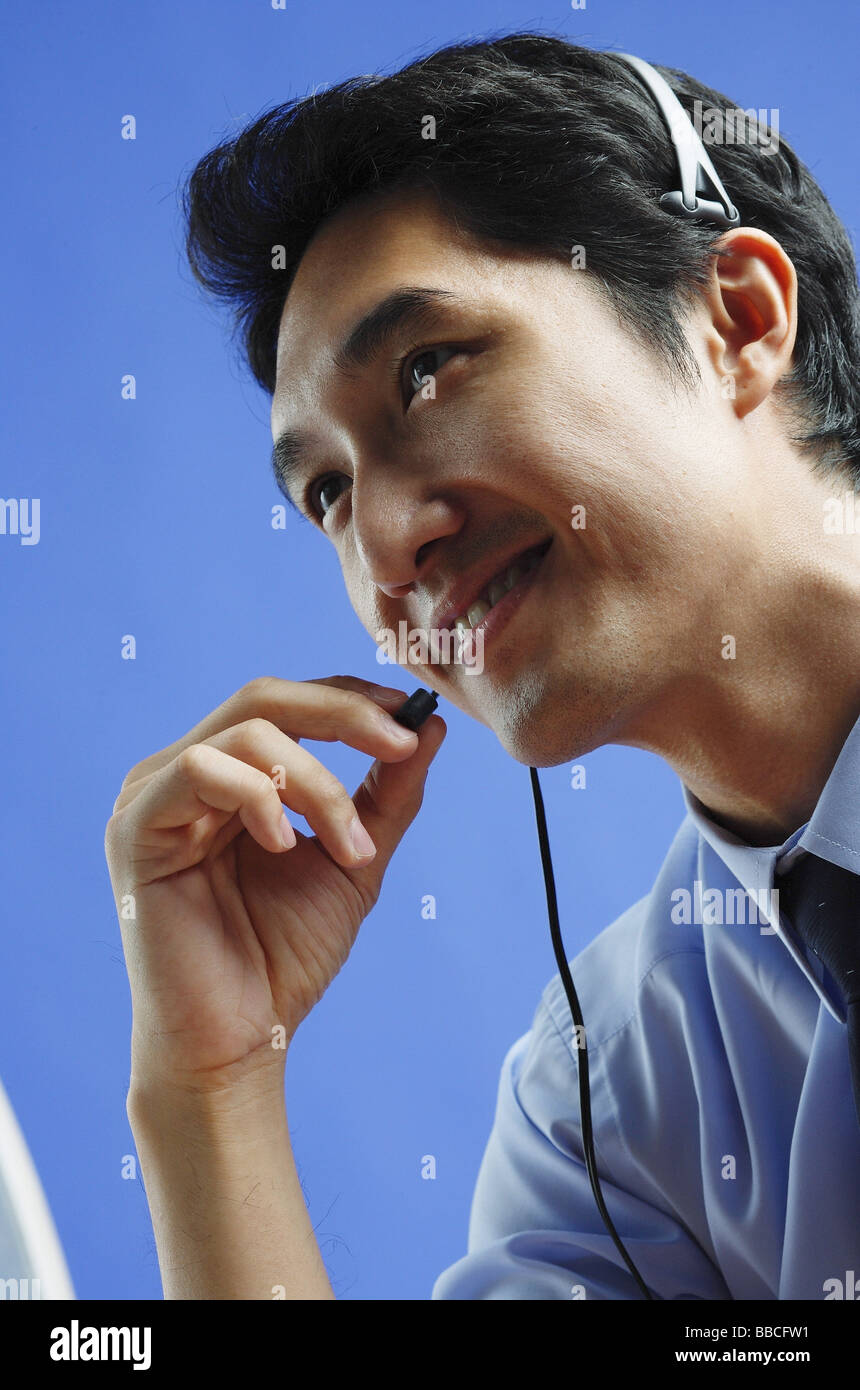 Man wearing headset Stock Photo - Alamy