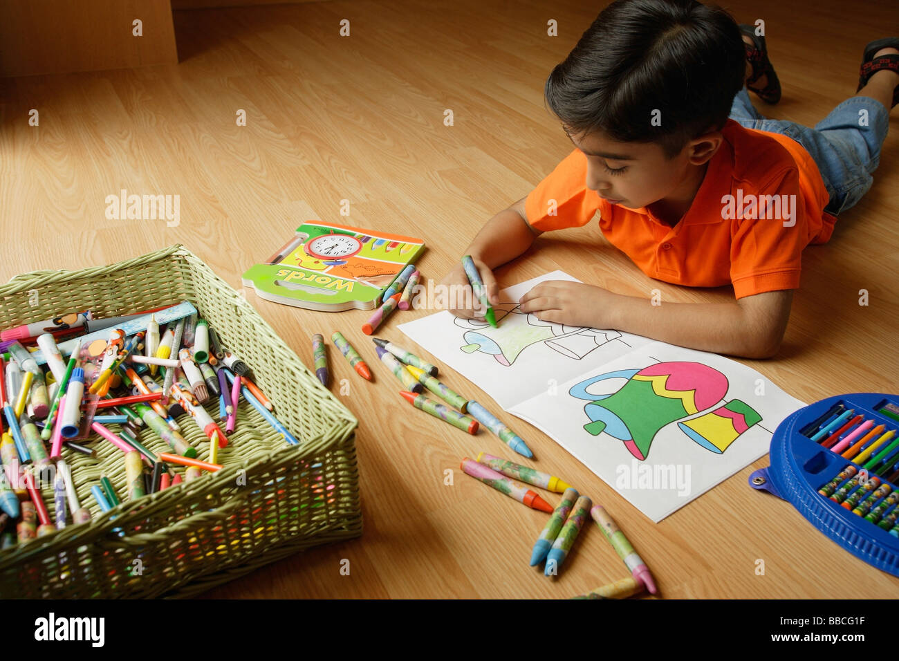 Little boy coloring Stock Photo - Alamy