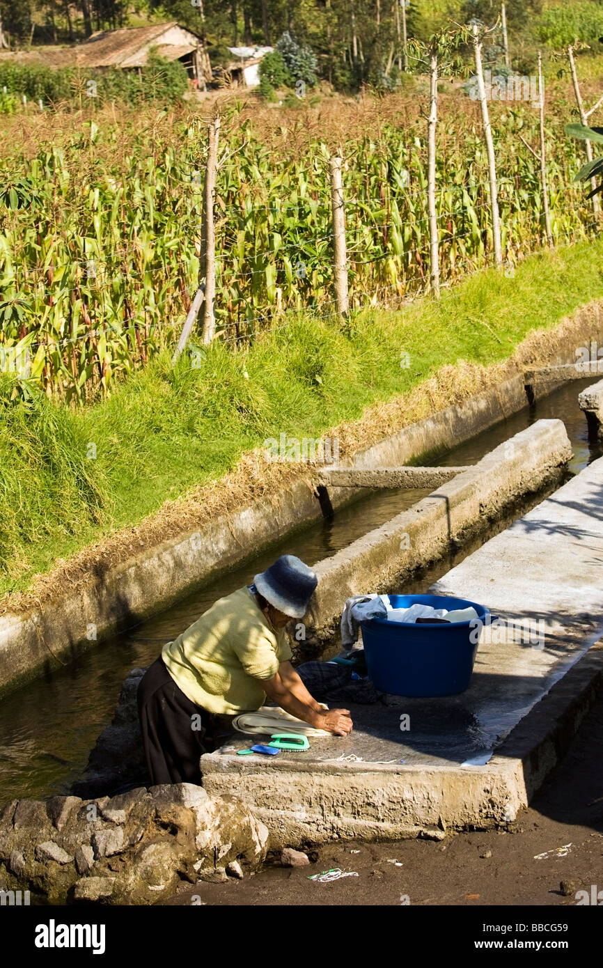 Indian woman washing clothes by hand hi-res stock photography and ...