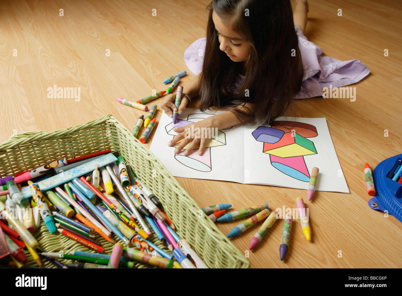 Little girl coloring Stock Photo - Alamy