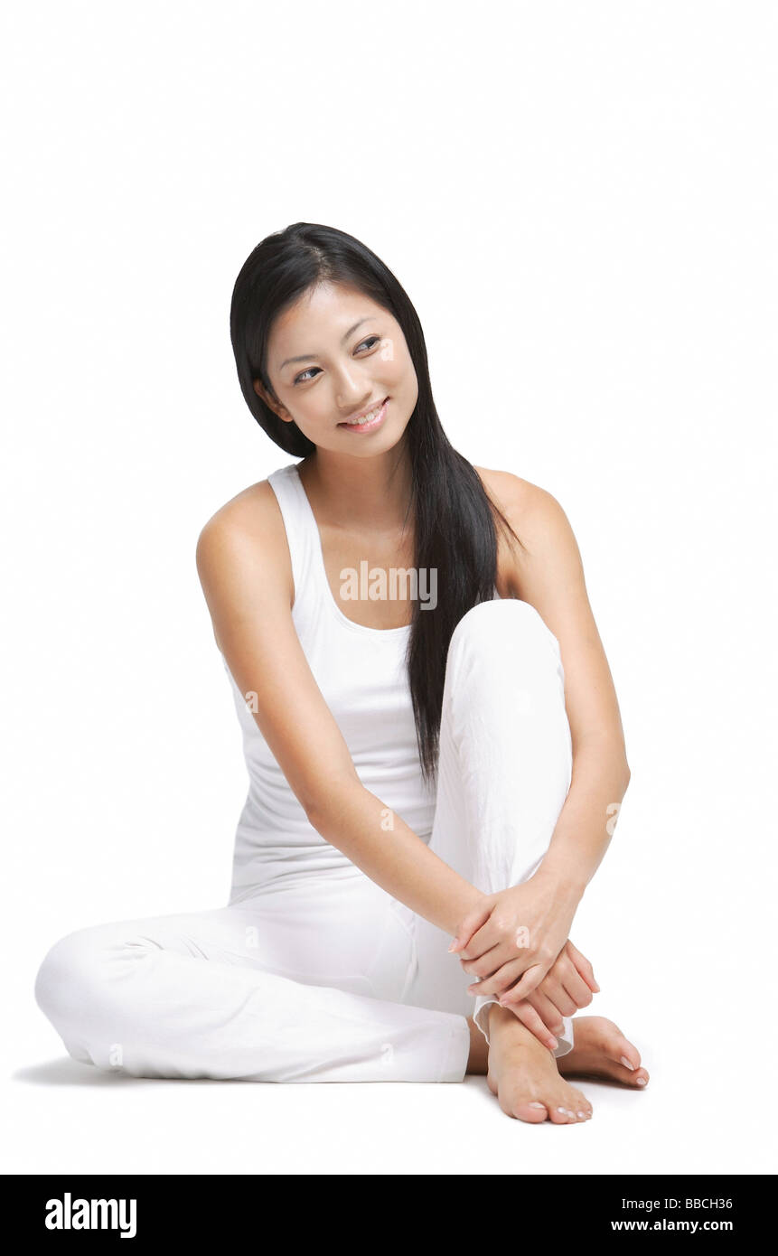 Hugging knee hi-res stock photography and images - Alamy