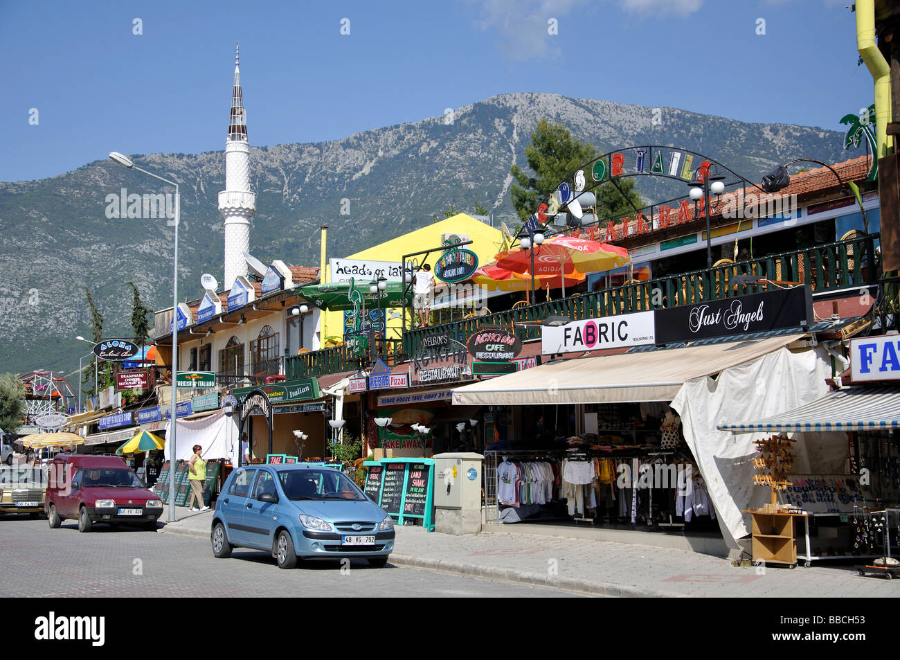 Street scene showing mosque minaret, Hisaronu, Mugla Province, Turkey ...