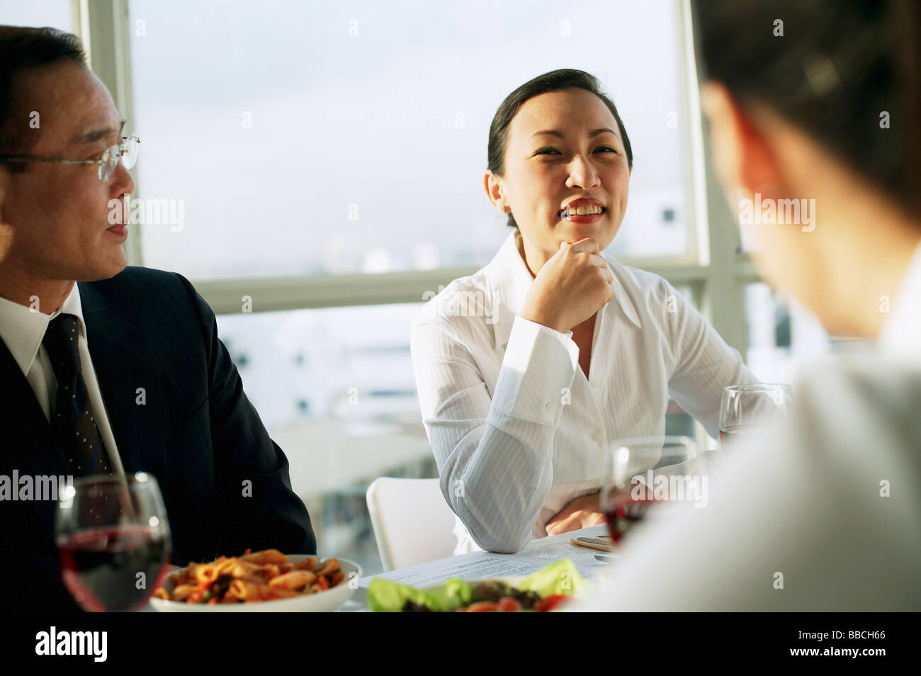 Executives having lunch Stock Photo - Alamy