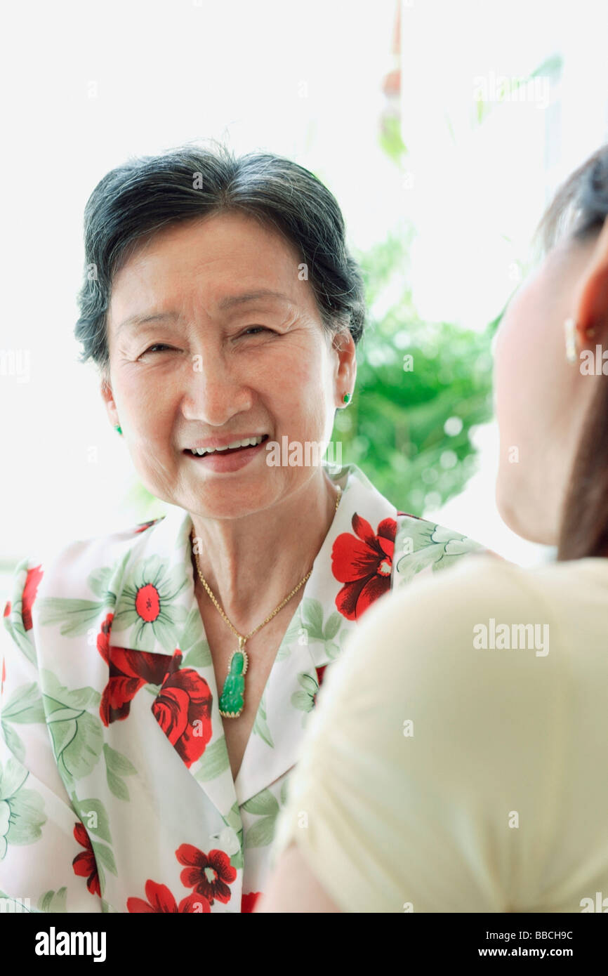 Mature woman smiling Stock Photo - Alamy
