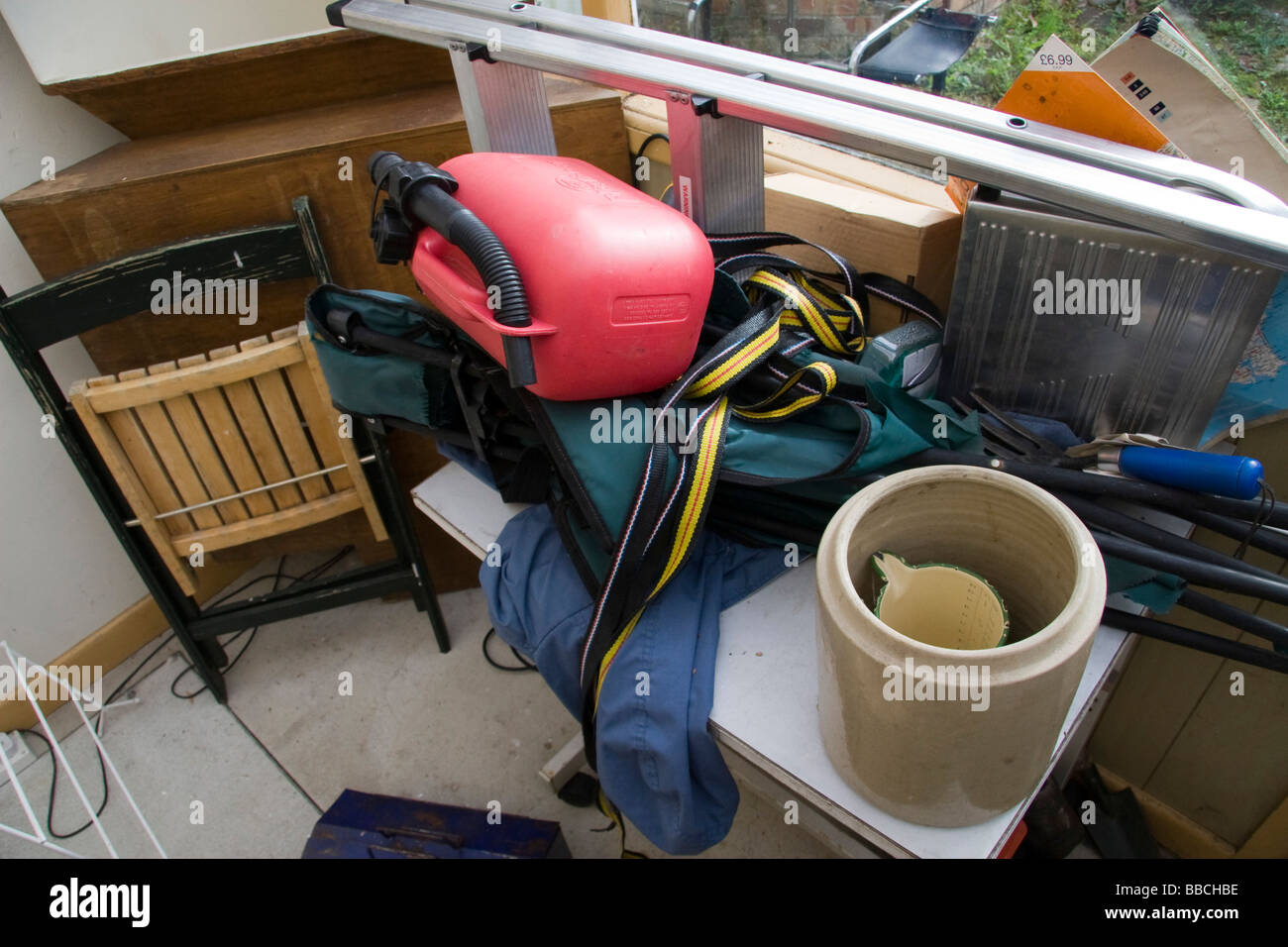 An untidy pile of stuff that came out of the car boot Stock Photo - Alamy