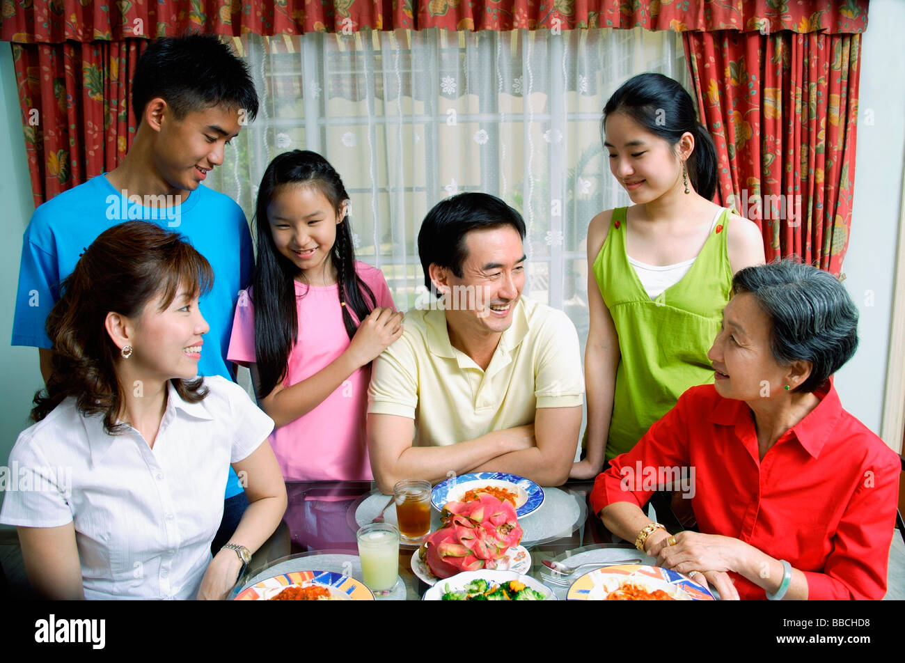 Three generation family at home Stock Photo - Alamy