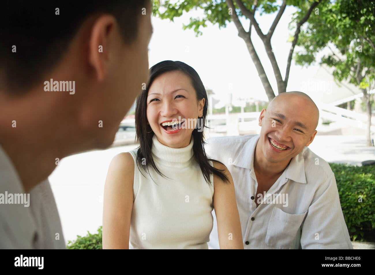 Young adults laughing, portrait Stock Photo - Alamy
